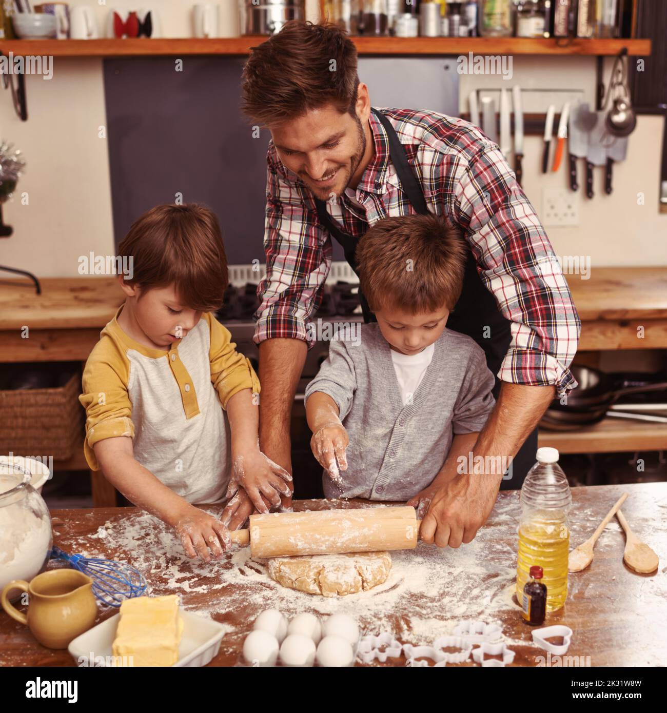 You boys are doing so well. Two cute little boys baking with their ...