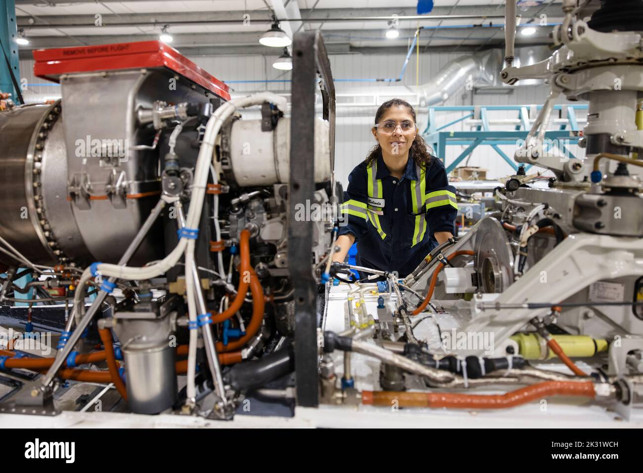 Engineer working on helicopter component Stock Photo - Alamy