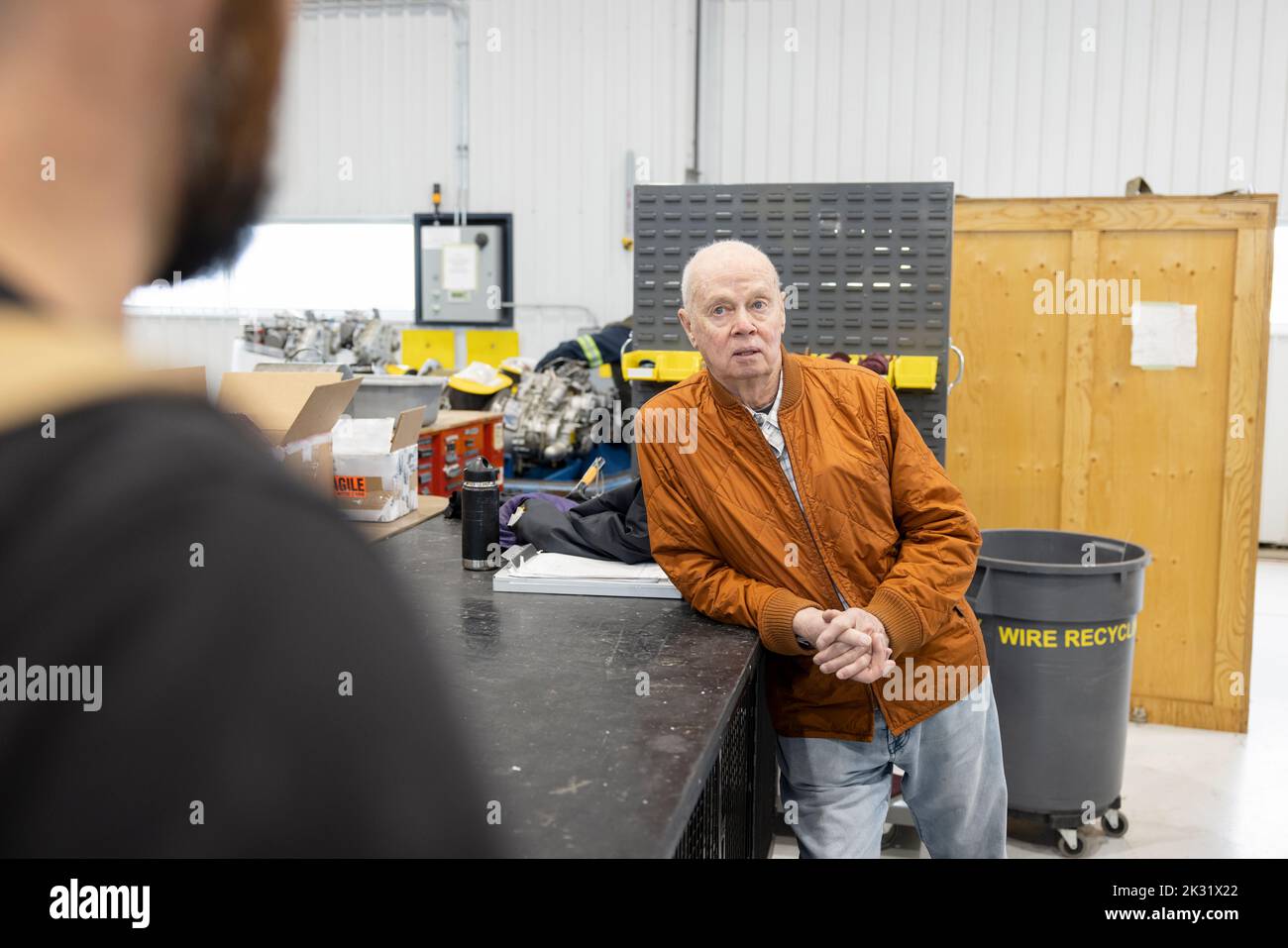 Leaning on counter hi-res stock photography and images - Alamy