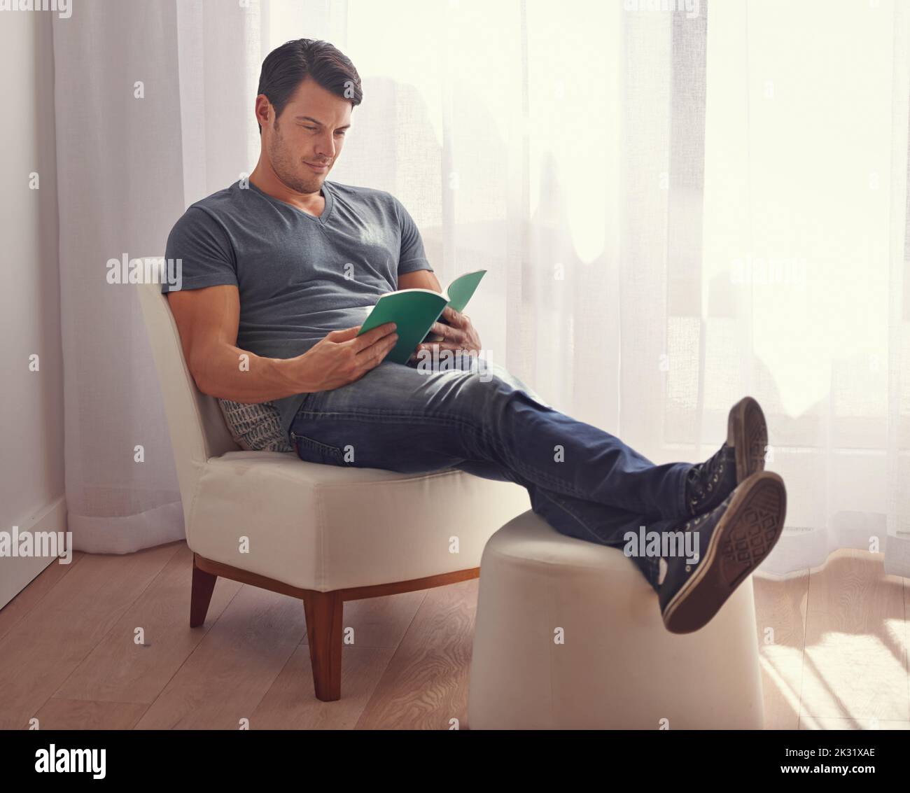 Handsome guy looking relaxed enjoying hi-res stock photography and ...
