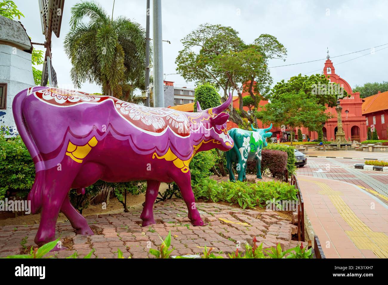 Melaka, Malaysia - Aug 25, 2022 Cows statue with painted decorated ...