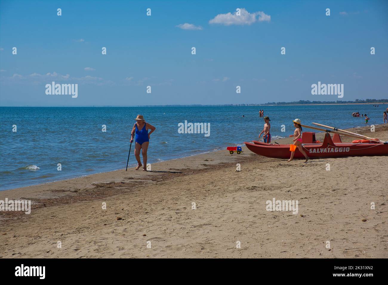 An aerial view of people walking in beach of Manfredonia Stock Photo ...