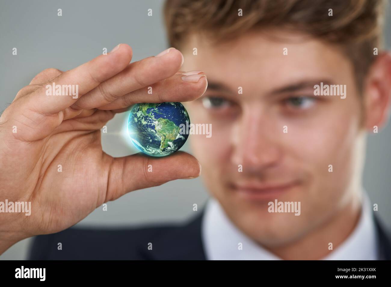 Business man holding globe hi-res stock photography and images - Alamy Business man holding globe hi-res stock photography and images - Alamy