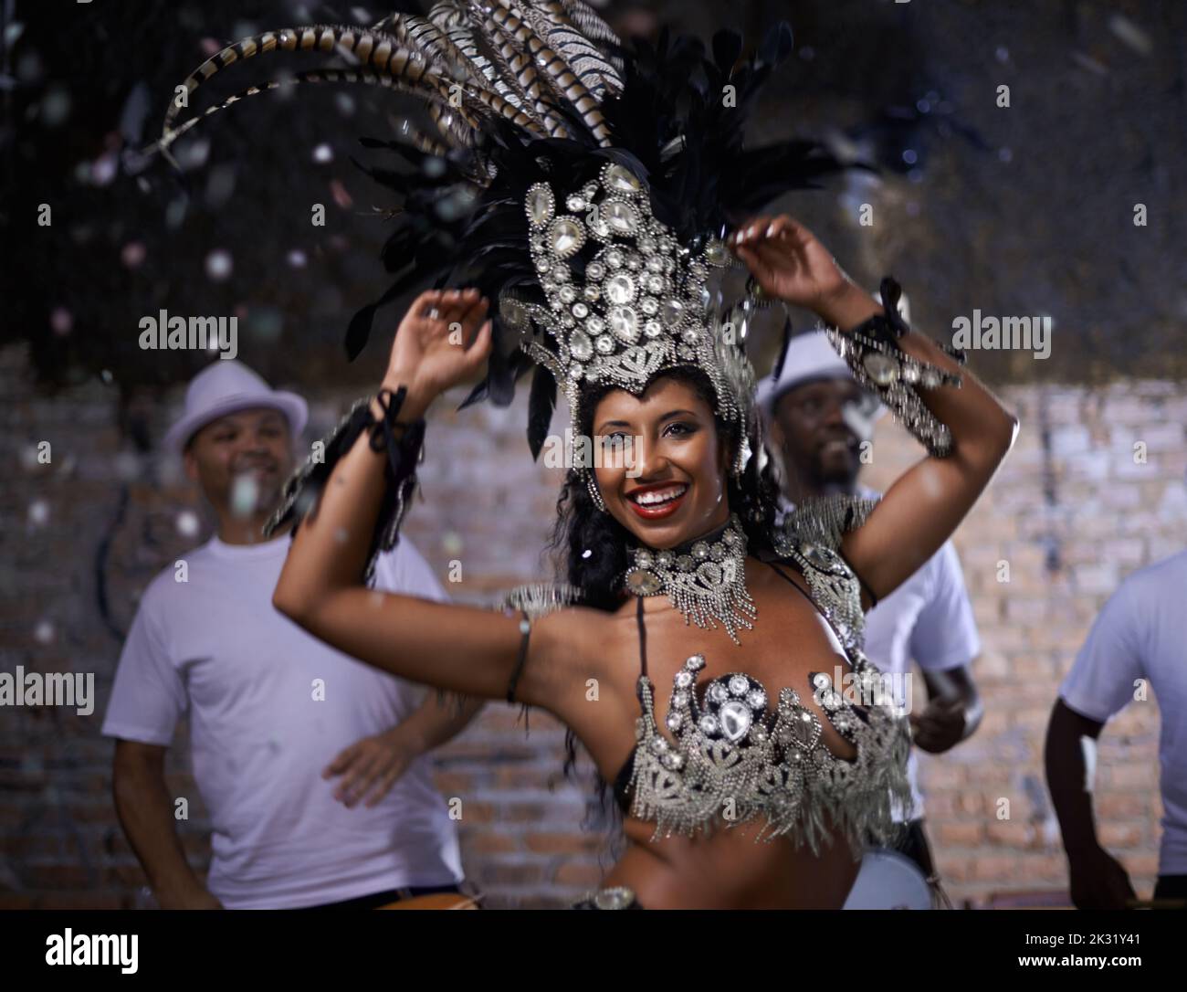 Glamourous dancing queen. a beautiful samba dancer performing in a ...