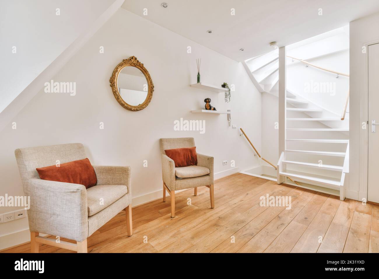 A cozy and spacious room with armchair in a luxury house Stock Photo ...