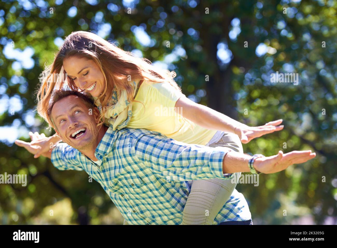 Still as playful as ever. a playful couple enjoying the summer sun ...