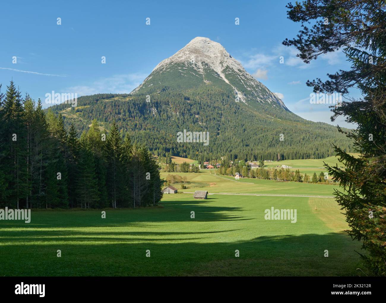 An aerial view of Hohe Munde mountain landscape surrounded by growing ...