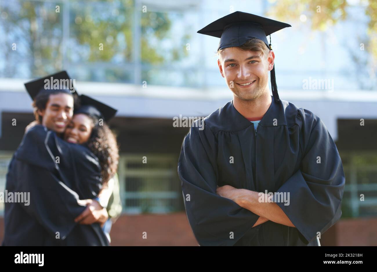Were ready for the real world. Outdoors shot of students on graduation ...