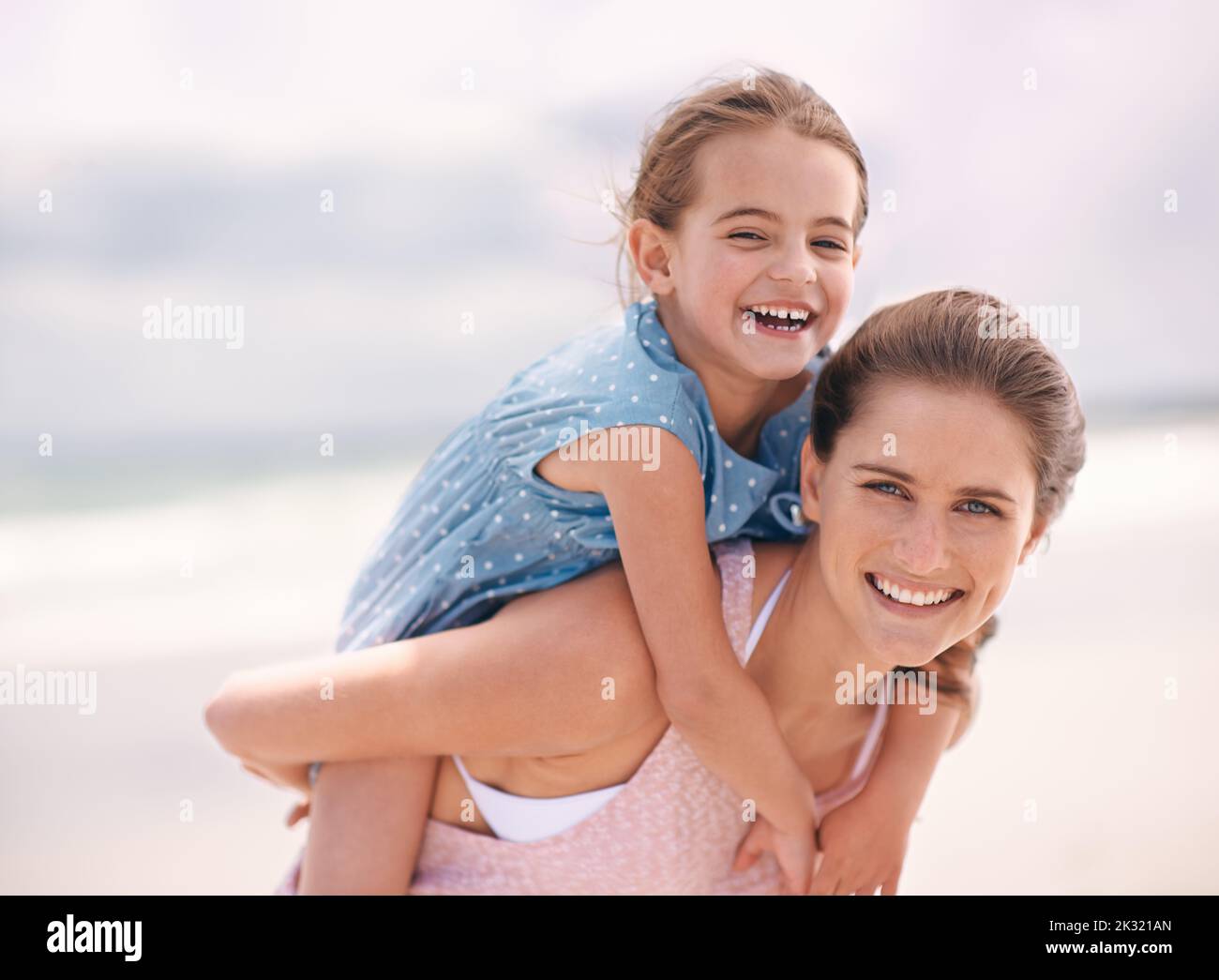 Spending quality time with mom. A little girl and her mother at the ...