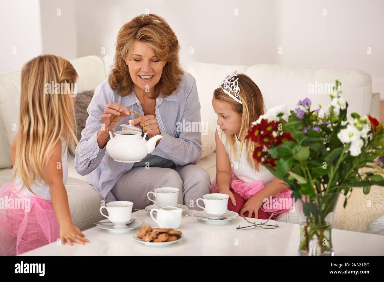 They invited granny to the tea party. a grandmother and her ...