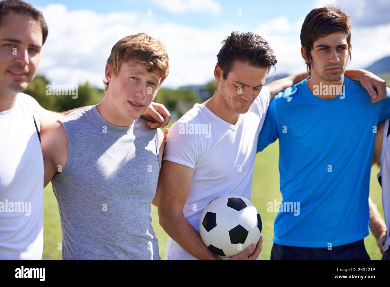 We love the game. a team of young soccer players Stock Photo - Alamy
