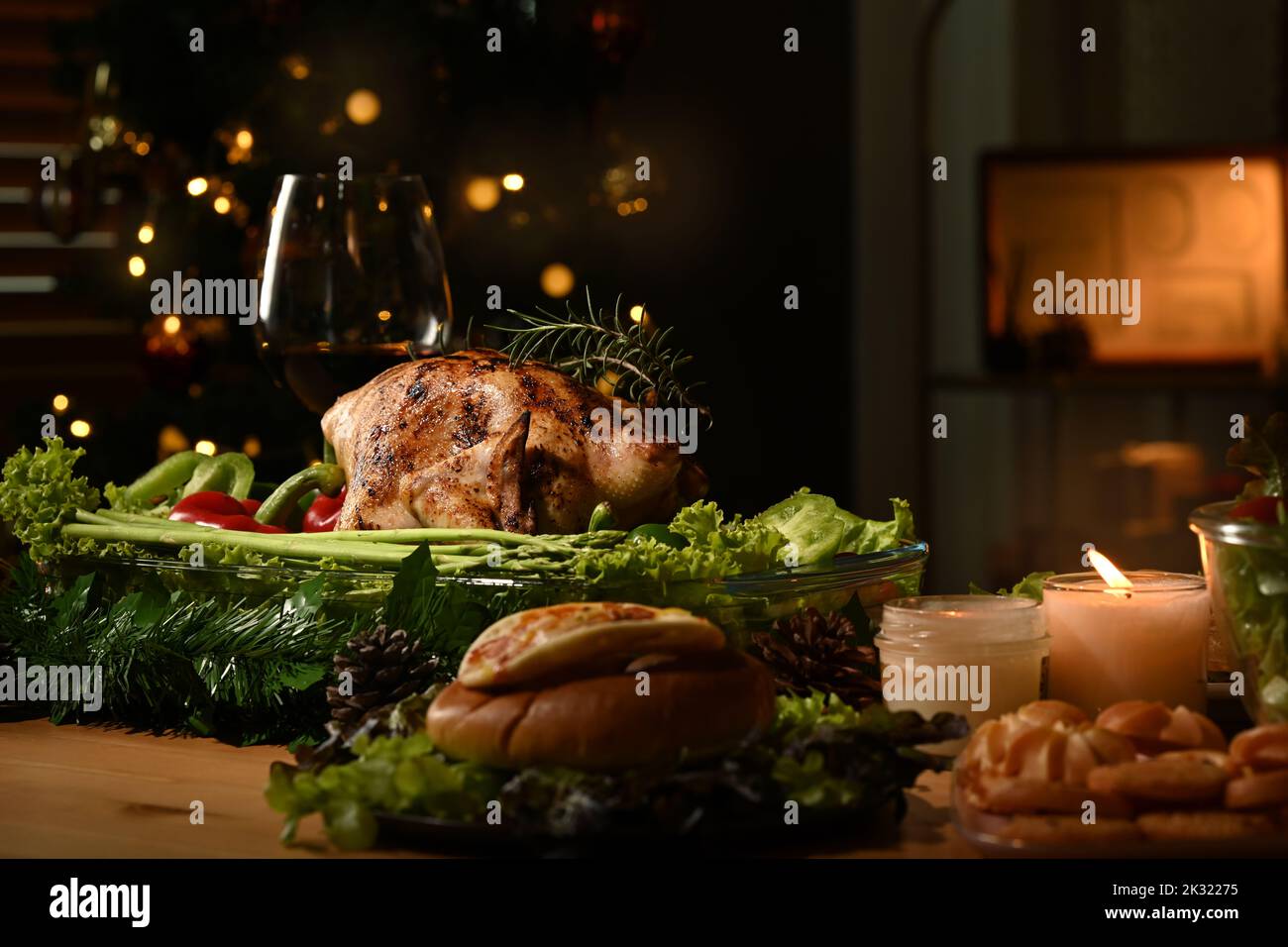 Roasted turkey on Thanksgiving table or Christmas dinner by candlelight ...