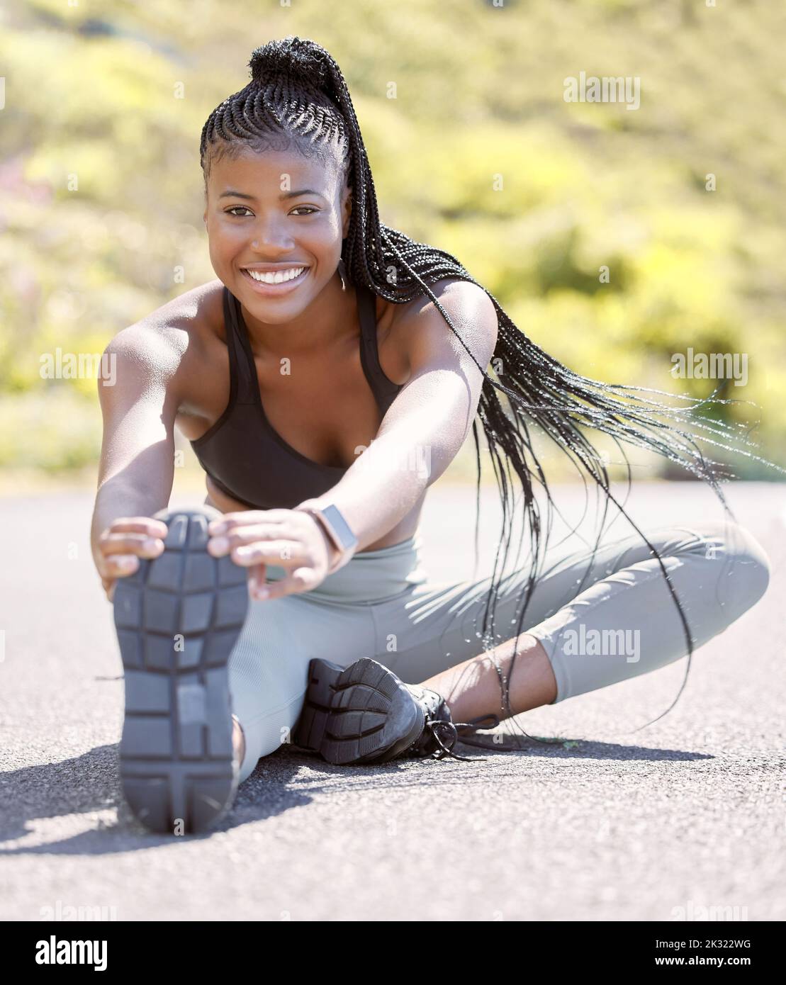 Sport, fitness and stretching with a sports woman getting ready for a ...