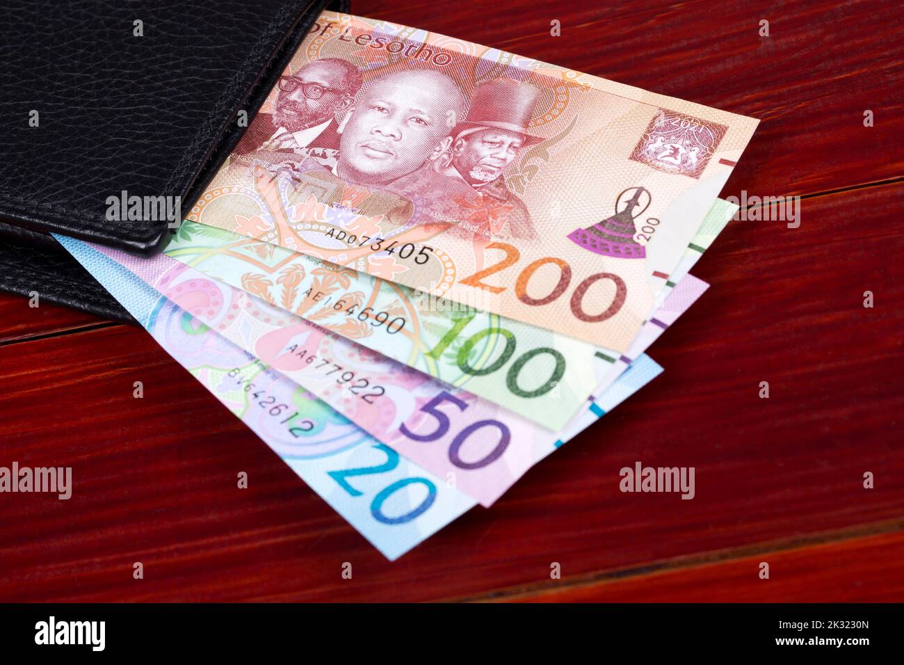 Banknotes of Lesotho - Maloti in the black wallet Stock Photo - Alamy