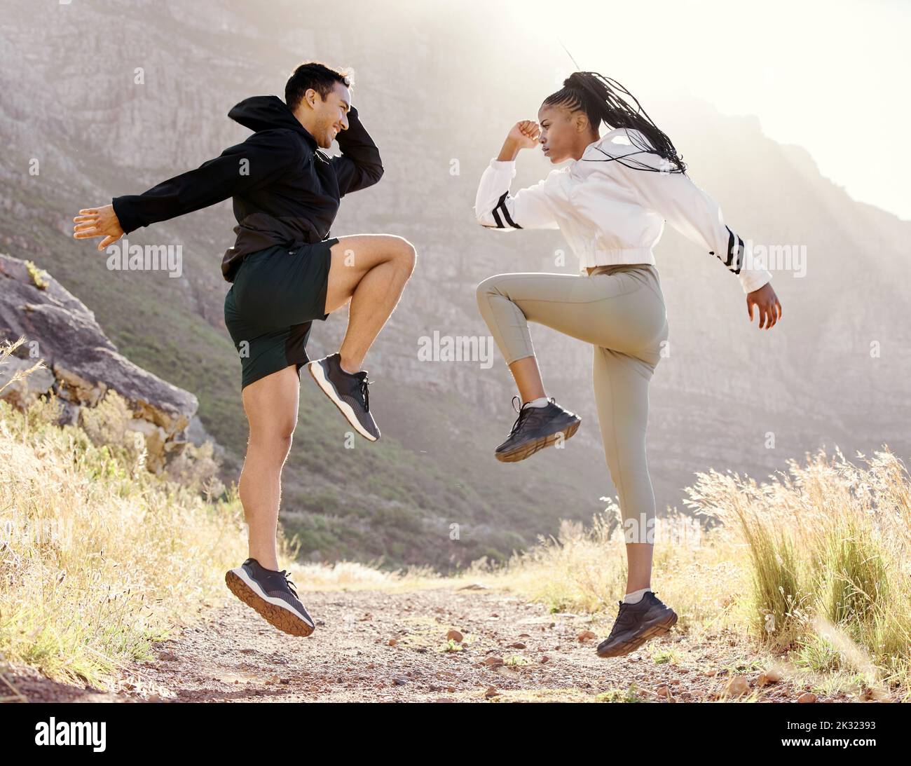 Fitness female partners jumping hi-res stock photography and images - Alamy