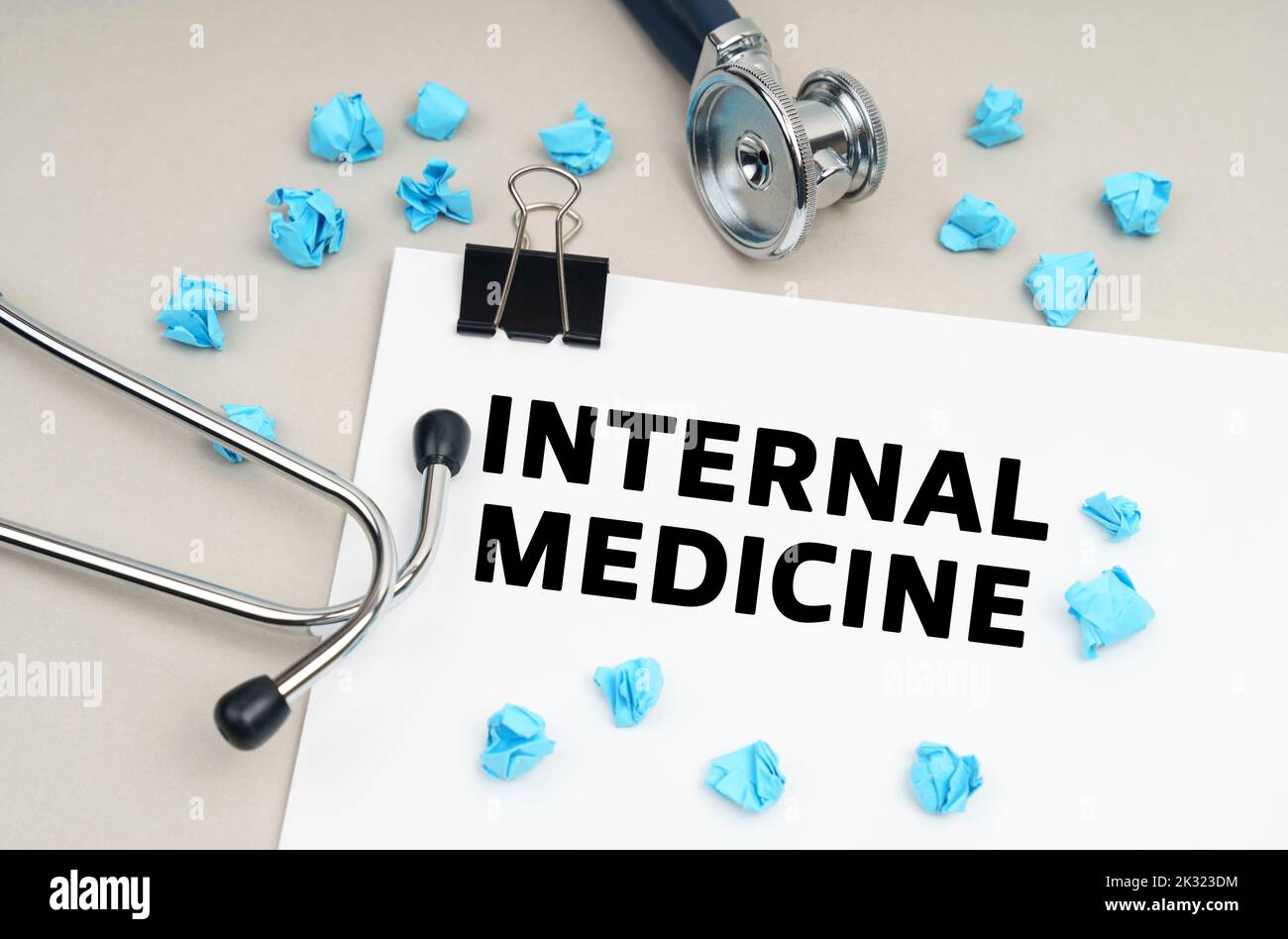 Medicine concept. On the table is a stethoscope, a pen, blue crumpled ...