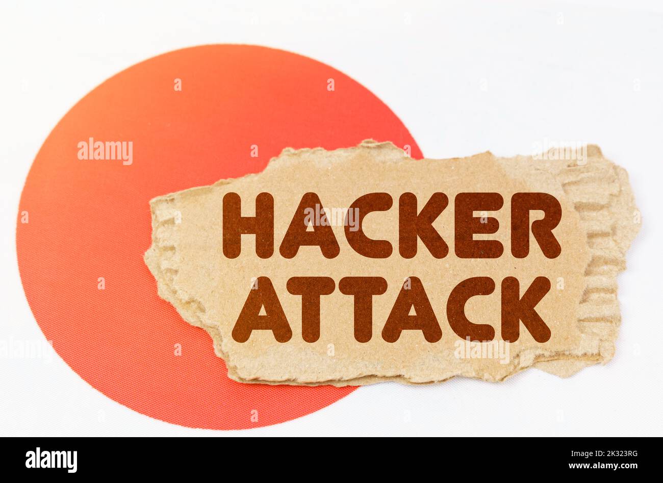 Information security concept. On the flag of Japan lies a notebook with ...