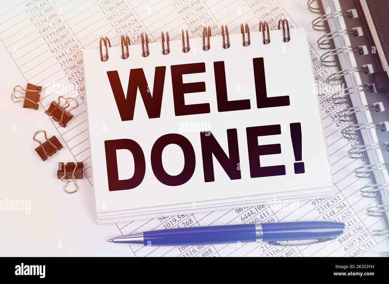 Business concept. On the table is a pen and a notebook with ...