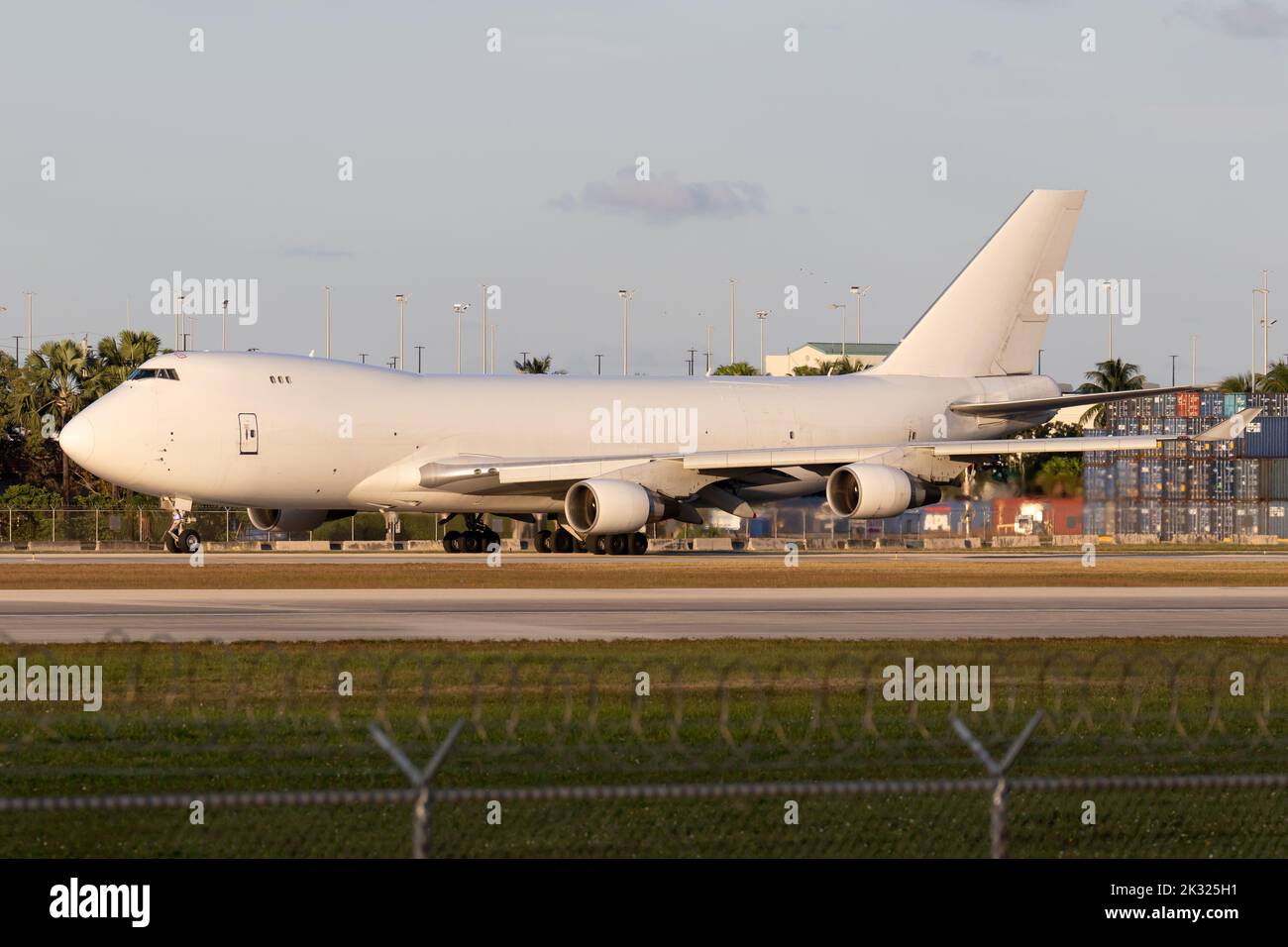 A Boeing 747 cargo freighter plane taxing at Miami Airport Stock Photo ...