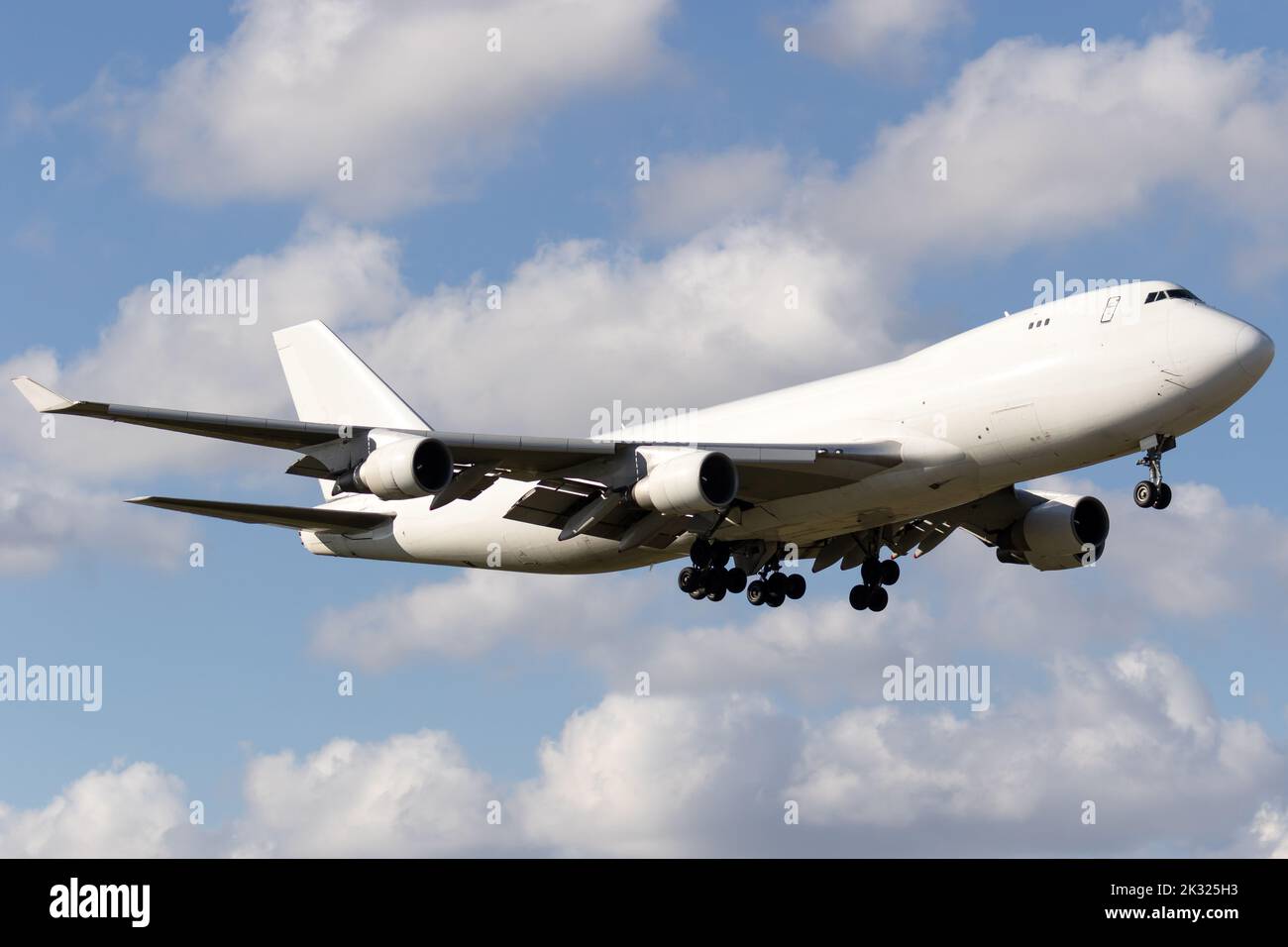 A Boeing 747 cargo freighter plane landing at Miami Airport Stock Photo ...