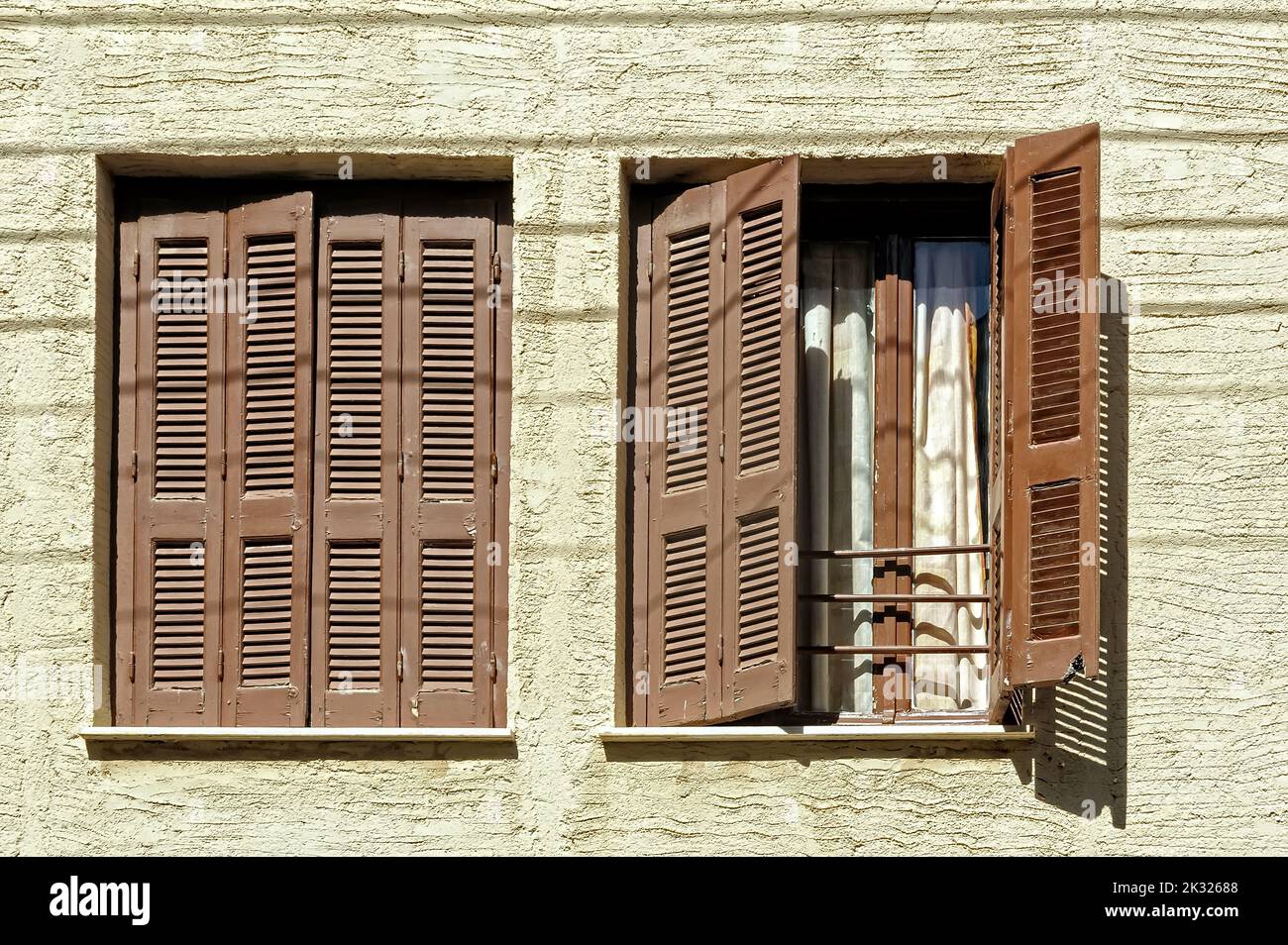 Two windows open and closed with shutters, Chania, Crete, Greece Stock ...