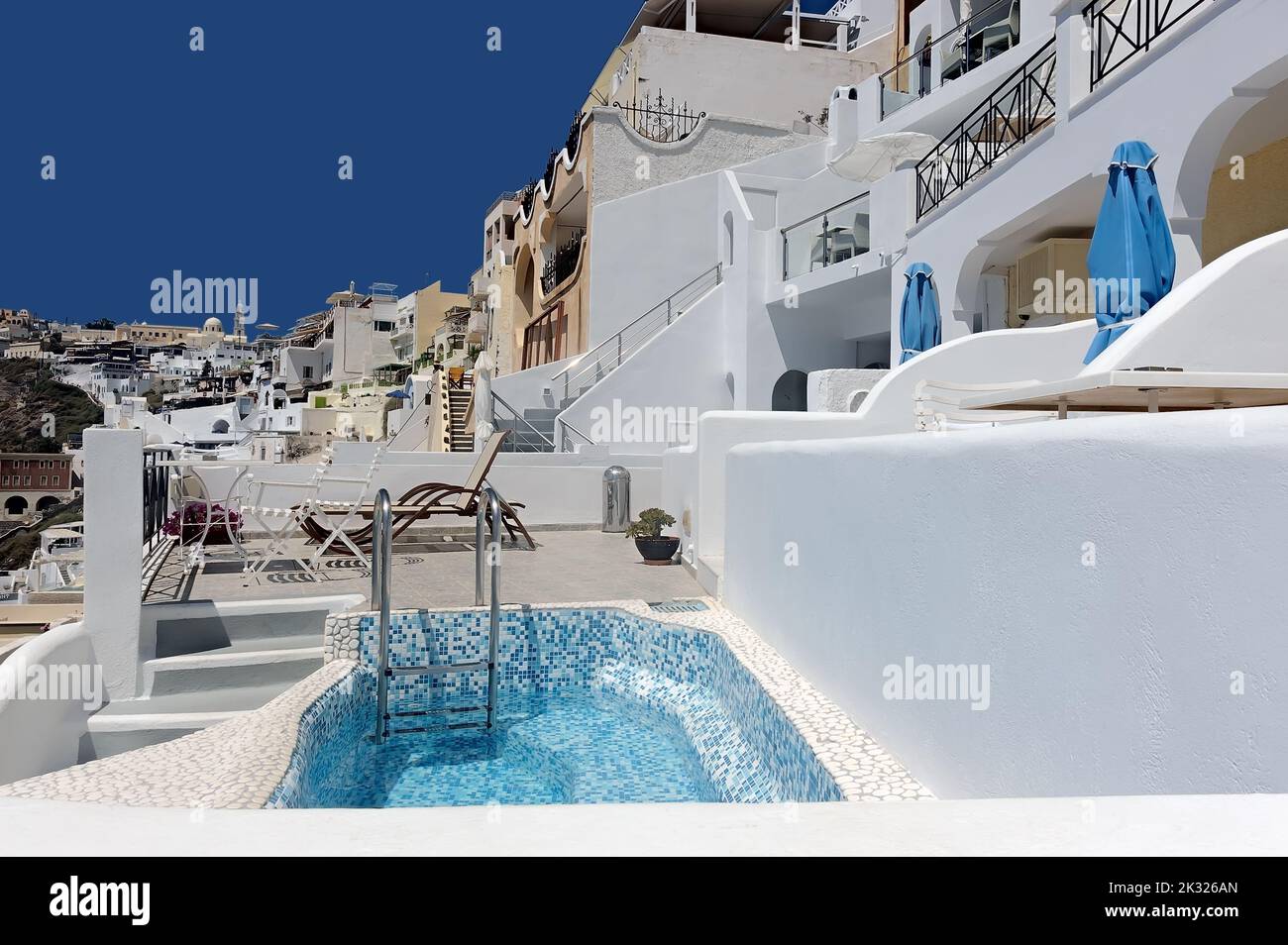 The terrace with all modern conveniences in Fira, Santorini Stock Photo ...