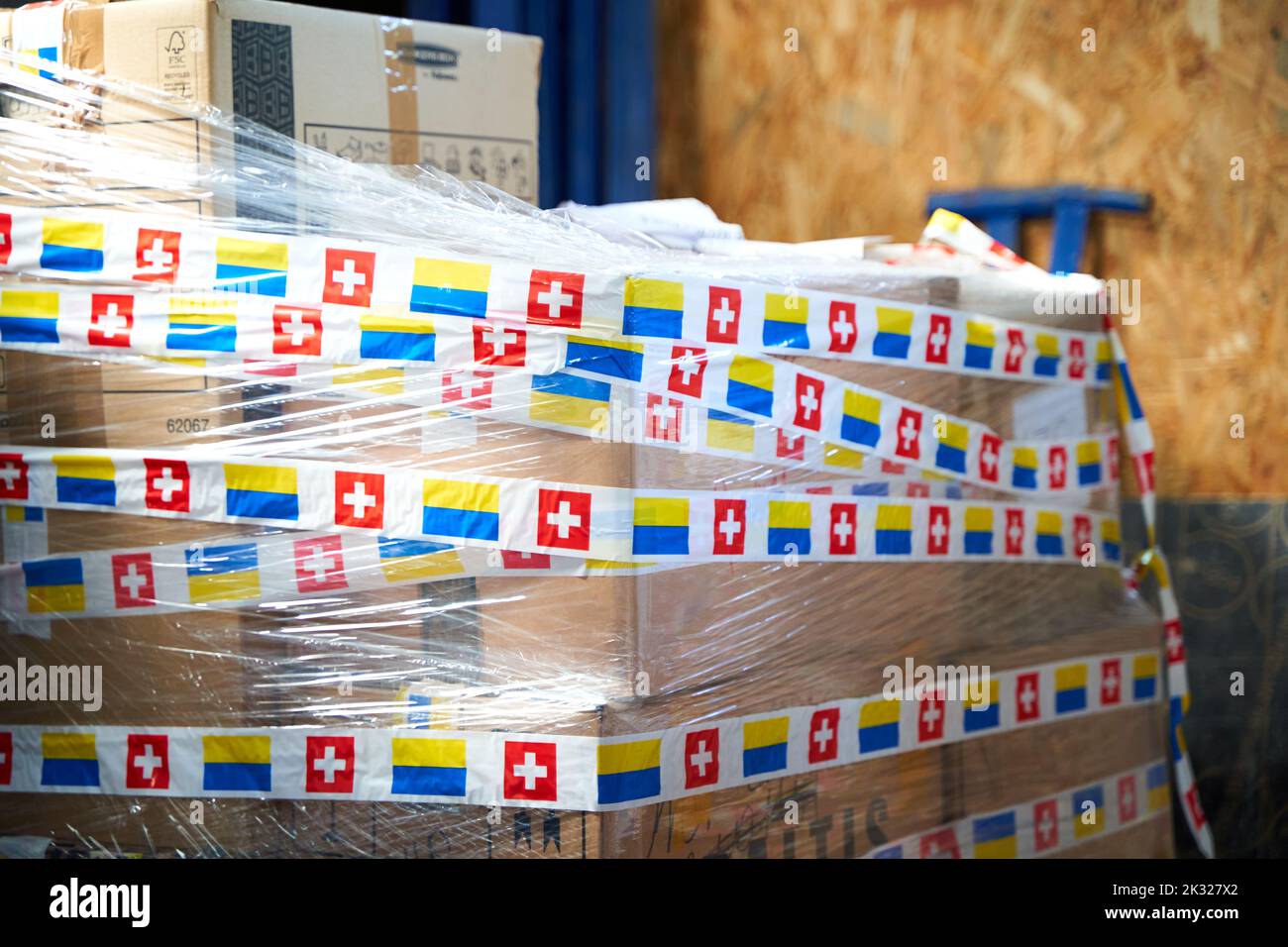 Boxes with humanitarian aid for Ukraine in volunteer centre warehouse ...