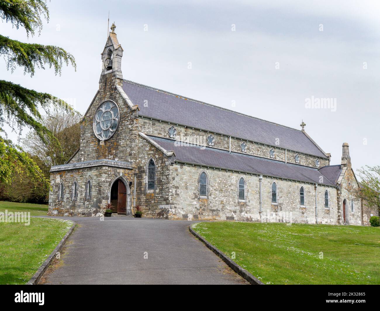 An church in Ireland. Cloudy weather and sky. Sacred Heart Roman ...