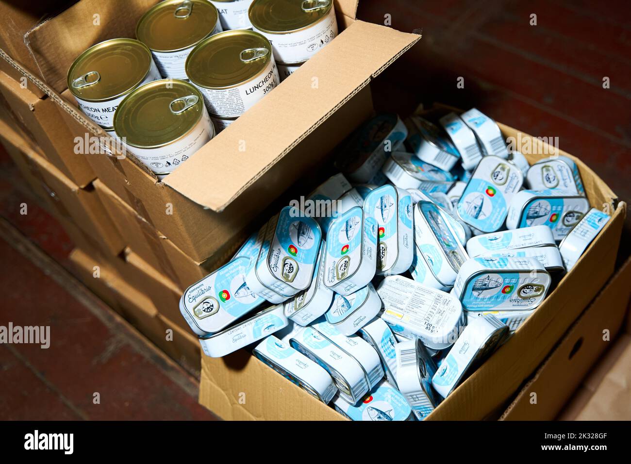 Humanitarian aid warehouse in ukrainian volunteer centre. Cardboard ...