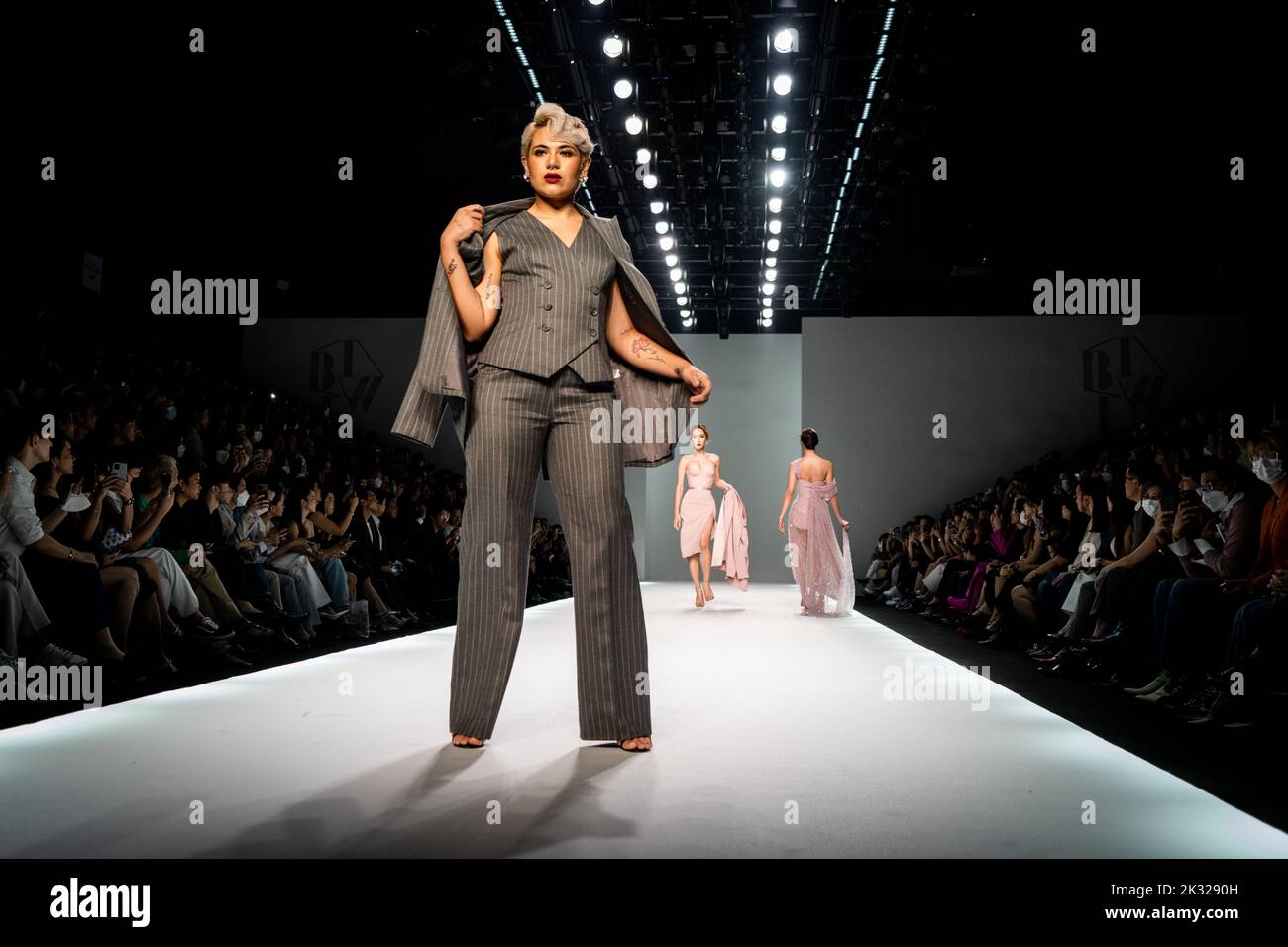 LGBTQ Thai artist Silvy Pavida walks the runway wearing the collection ...