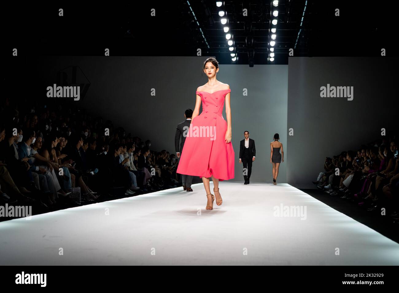 A model walks the runway for the Thai fashion brand POEM at Siam ...
