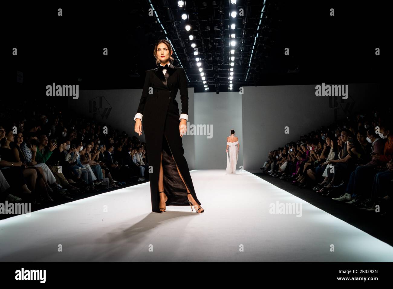 A model walks the runway for the Thai fashion brand POEM at Siam ...