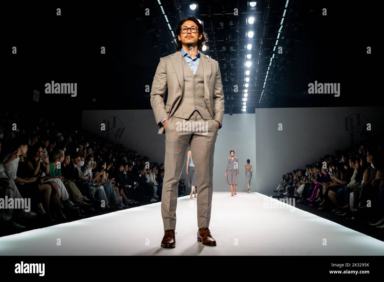 A model walks the runway for the Thai fashion brand POEM at Siam ...