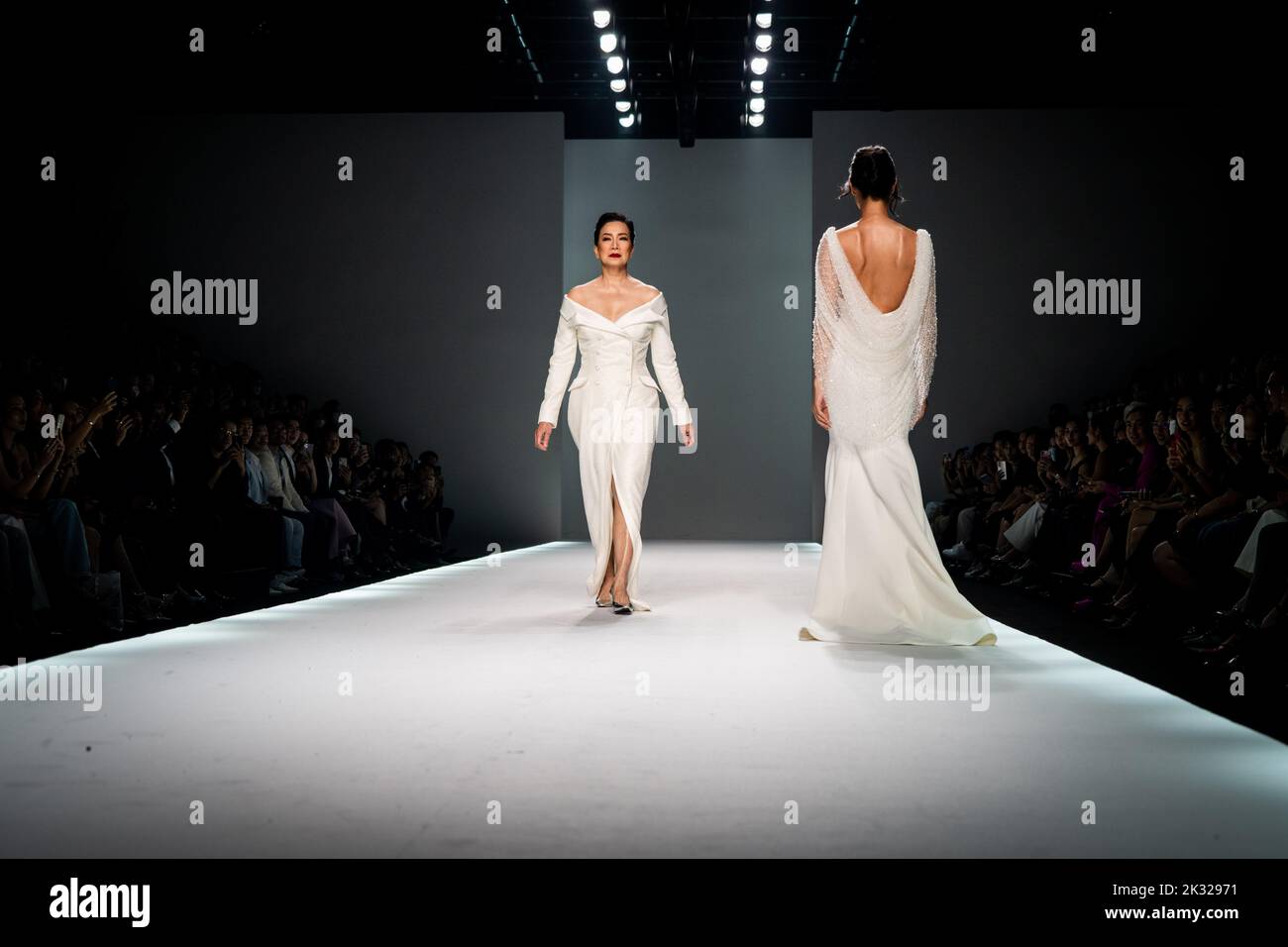 A model walks the runway for the Thai fashion brand POEM at Siam ...