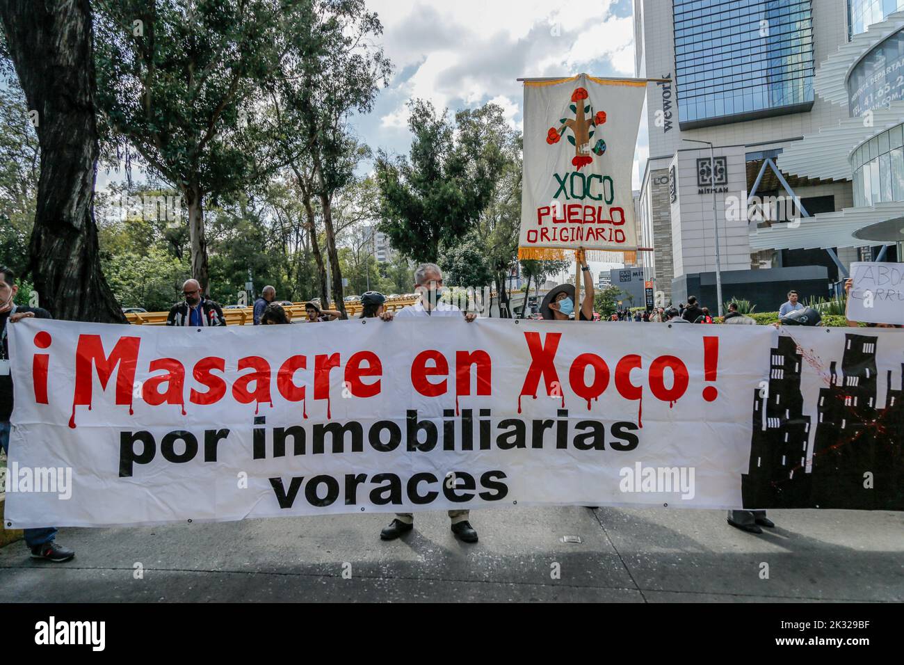 Mexico City, Mexico. 23rd Sep, 2022. Protesters carry a banner during a ...