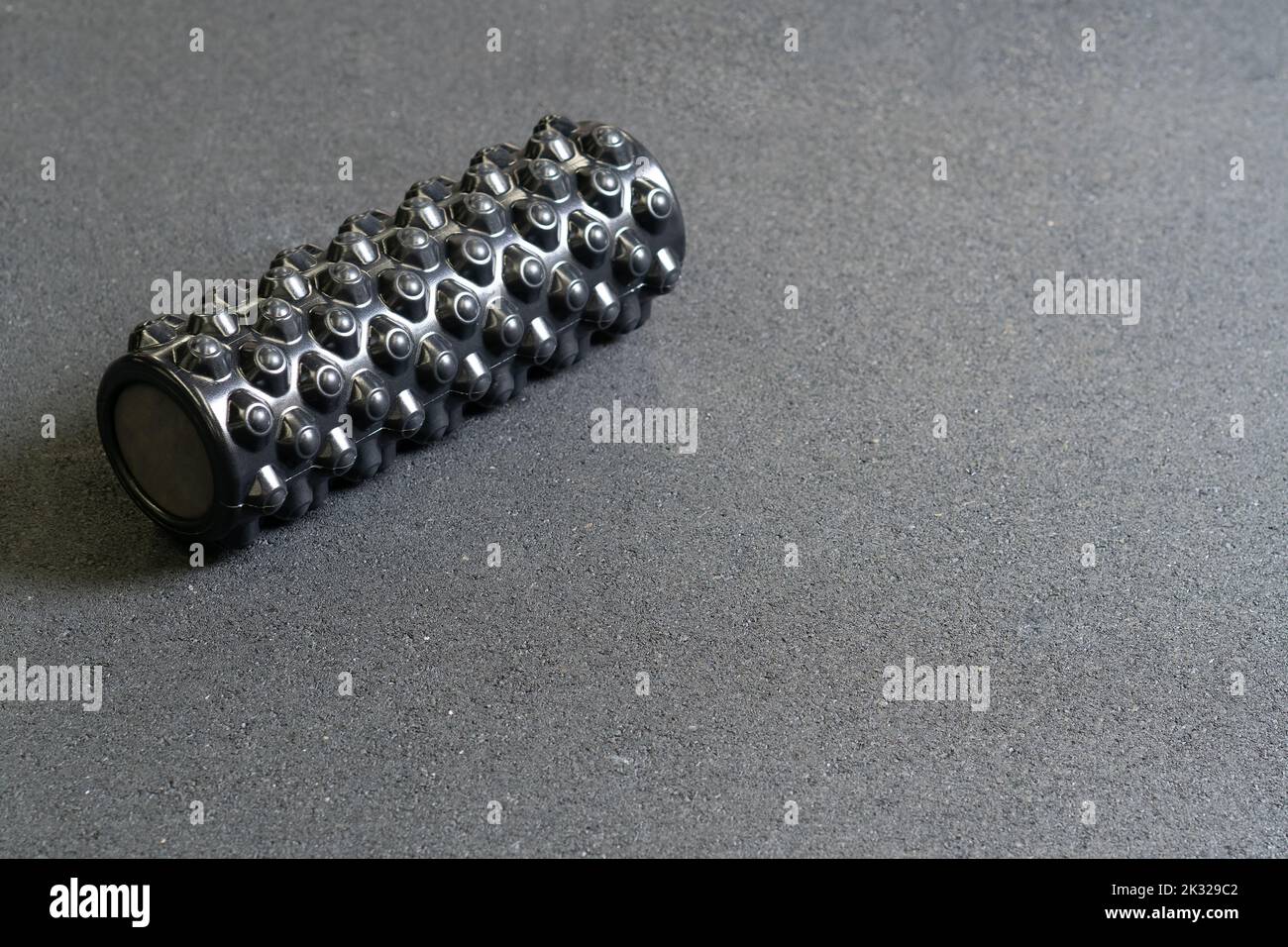 Black foam athletic massage roller exercise sport fitness workout, from ...