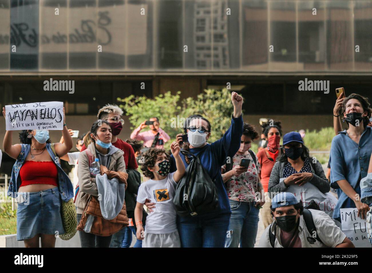 Protesters shout slogans at the entrance of the shopping center during ...