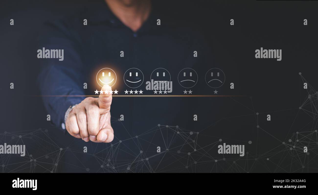 Businessman pressing icon emoticon face smiley on virtual touch screen ...