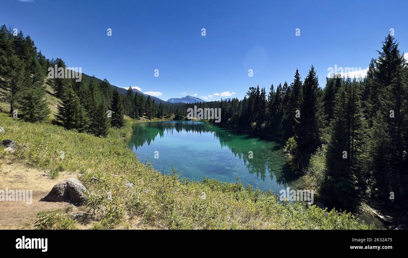 A scenic view of Valley of the Five Lakes in Jasper National Park in ...