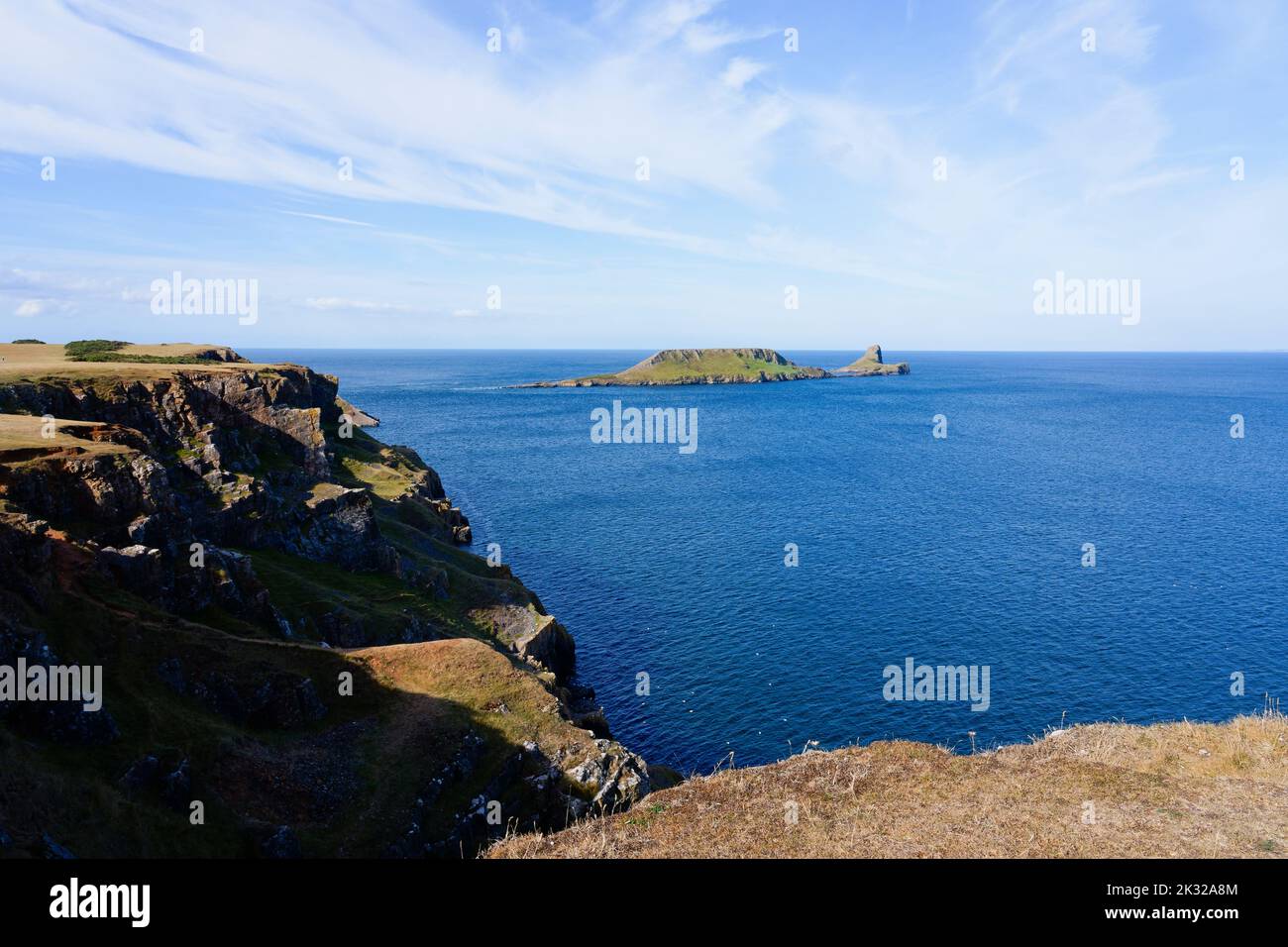 On the top of the rugged limestone cliffs at Rhossili to Worms Head ...