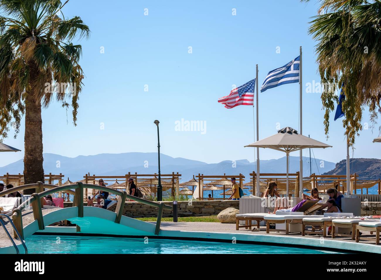 Ios, Greece - September 13, 2022 : Young female tourists enjoying an ...