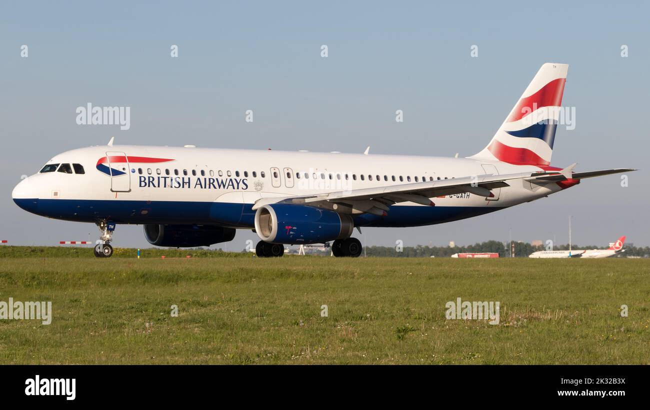 Airbus A320 of British Airlines taxing for departure at Amsterdam ...