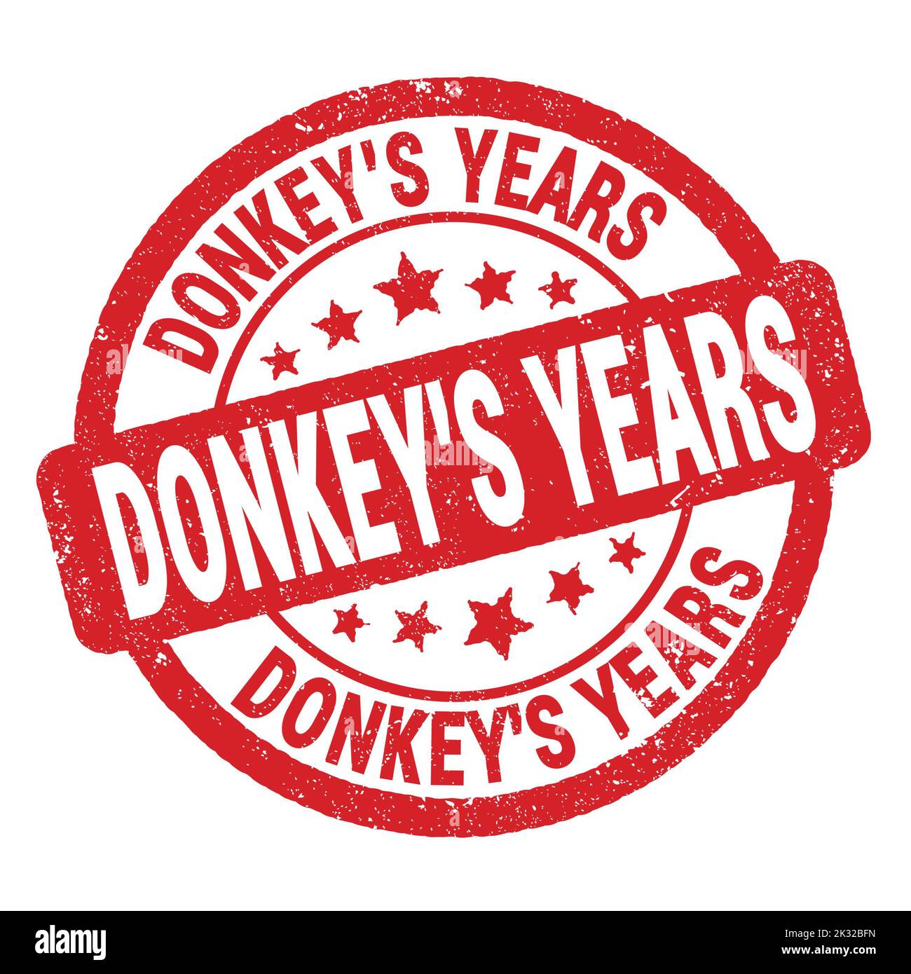 DONKEY'S YEARS text written on red grungy stamp sign Stock Photo - Alamy
