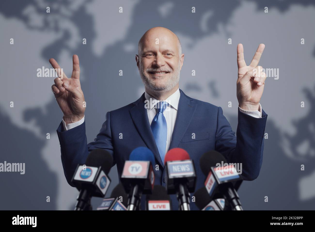 Confident successful leader interviewed by the media, he is smiling and ...