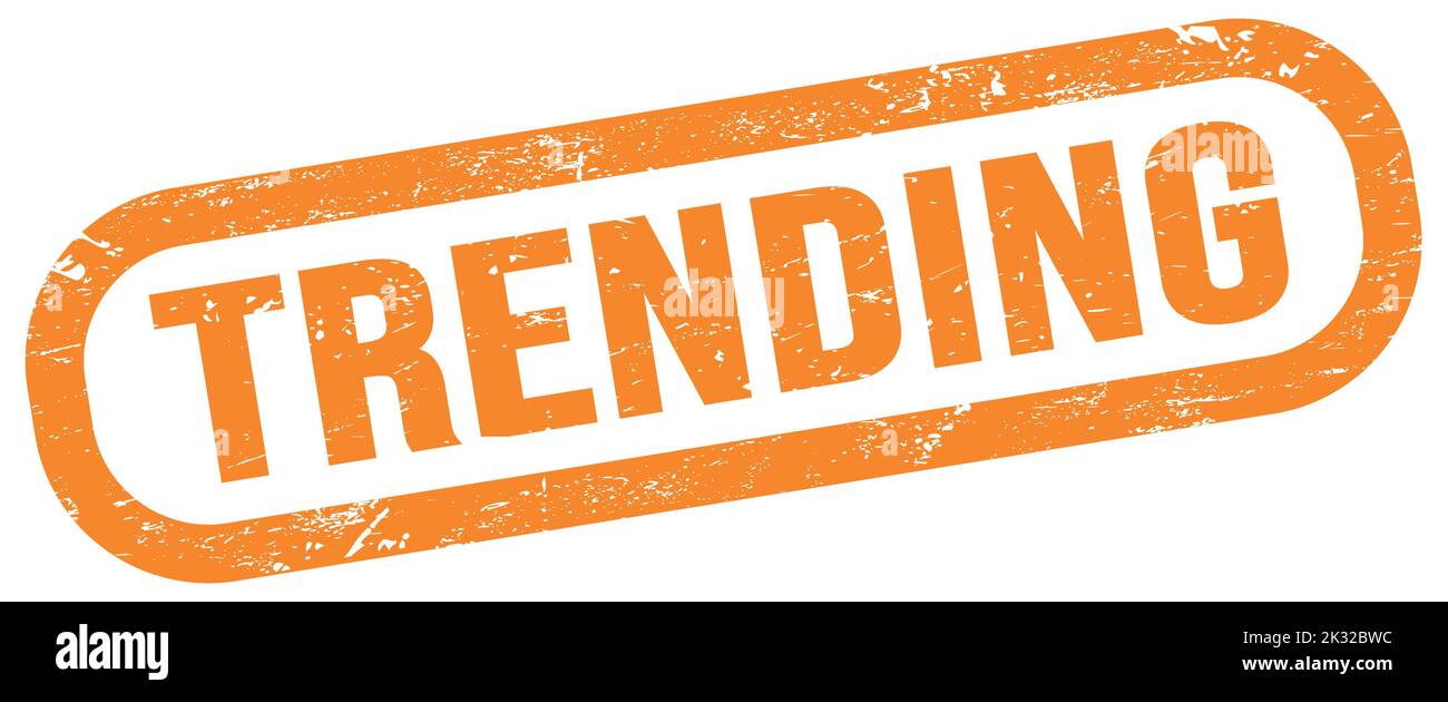 TRENDING, text on orange rectangle stamp sign Stock Photo - Alamy
