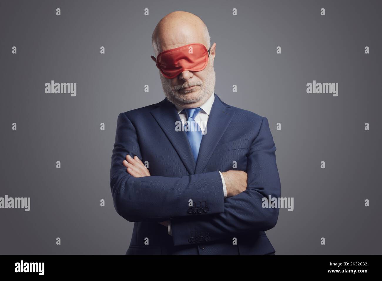 Sleepy careless businessman sleeping and wearing a sleep mask over his ...
