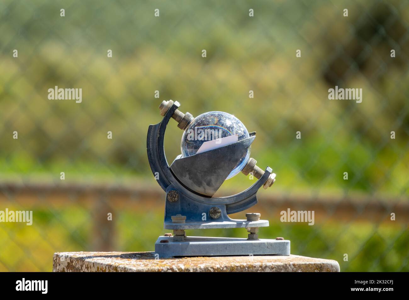 Heliograph, a meteorological instrument used to record the duration and ...