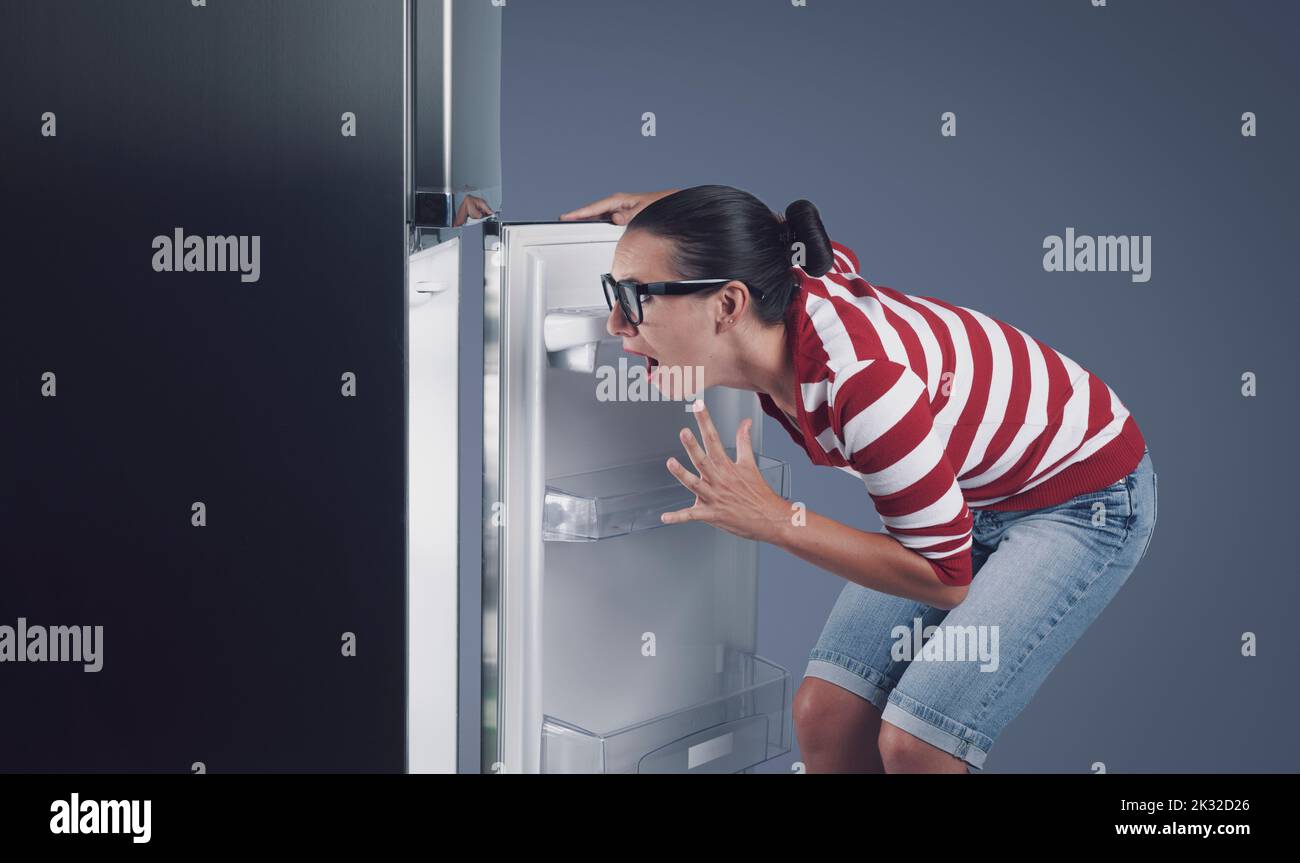 Angry looking in fridge hi-res stock photography and images - Alamy