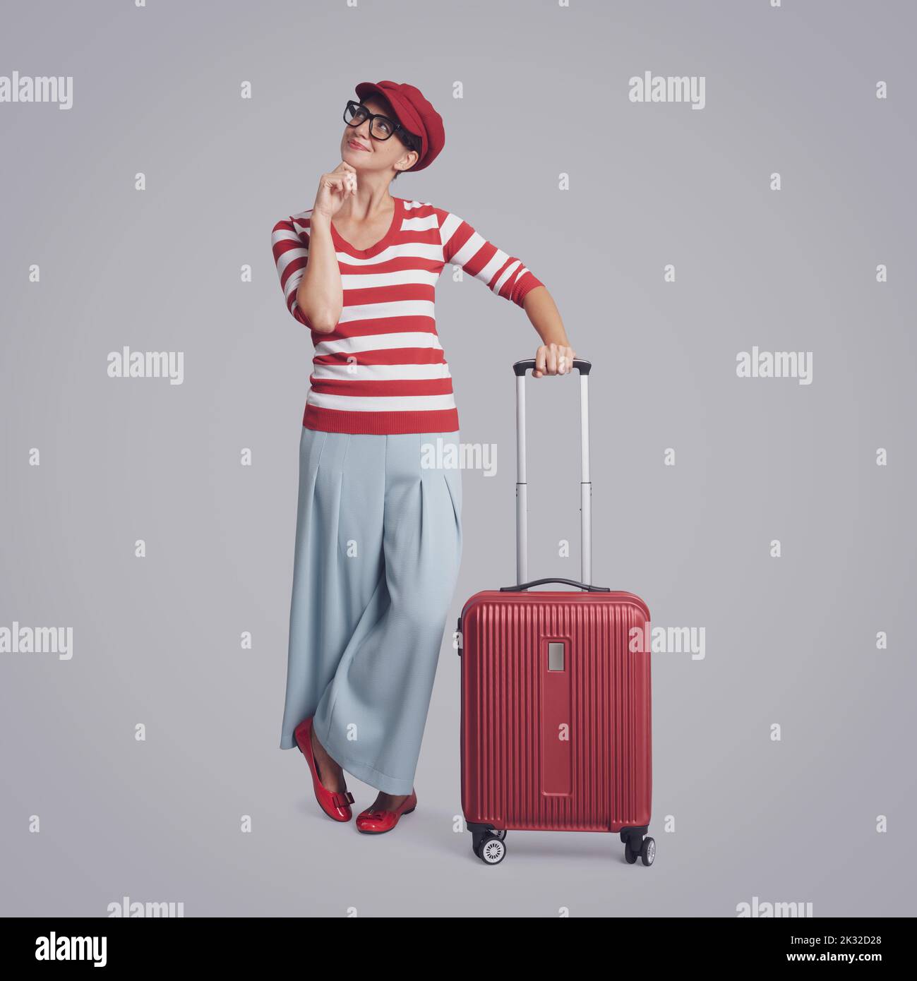 Happy traveler woman thinking with hand on chin, travel and ...