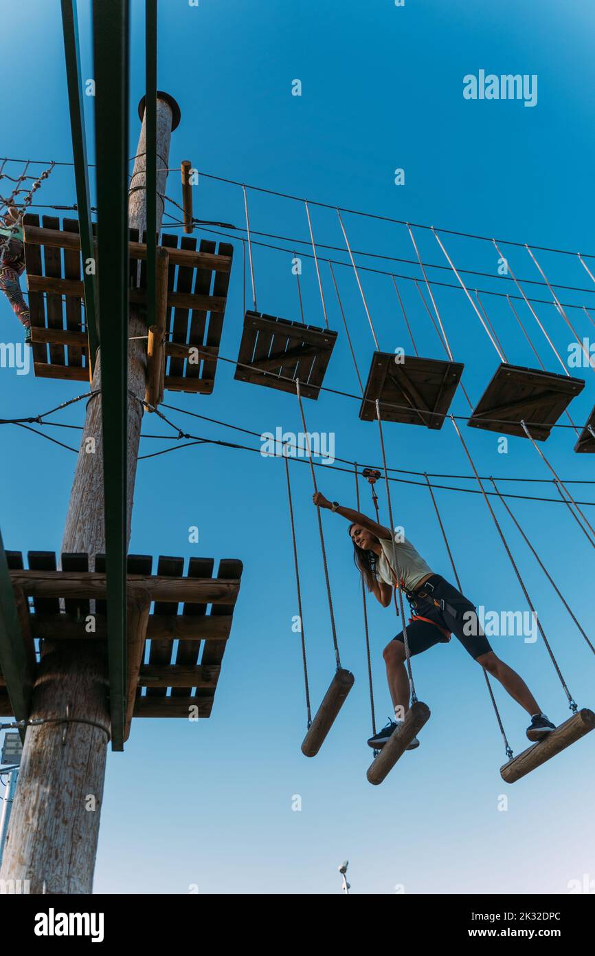 Woman handling the hardest rope level with no difficulty in an ...